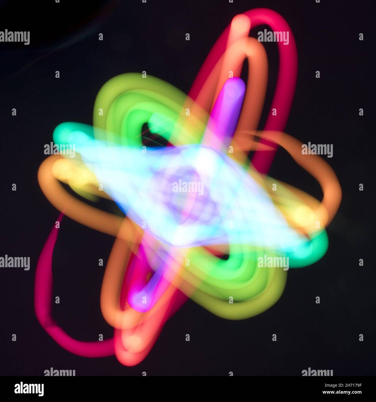 Abstract rainbow path of moving LED light on black backgroung Stock ...