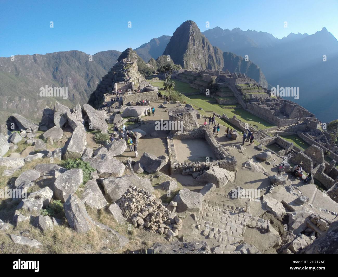 Ruins of the Inca city of Machu Picchu in the Andes Mountains in Peru ...
