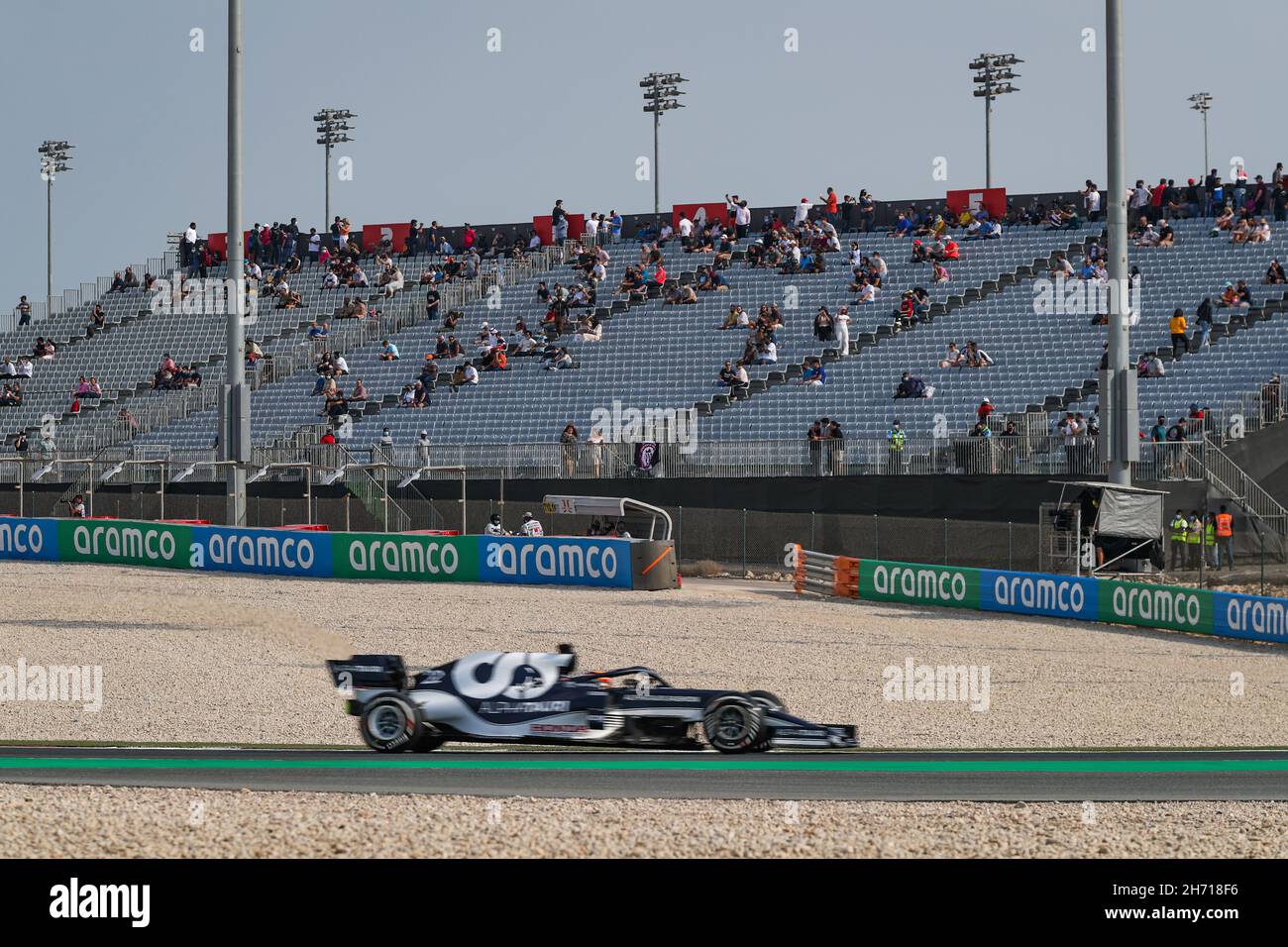 Empty grandstands, with cars running during the Formula 1 Ooredoo Qatar ...