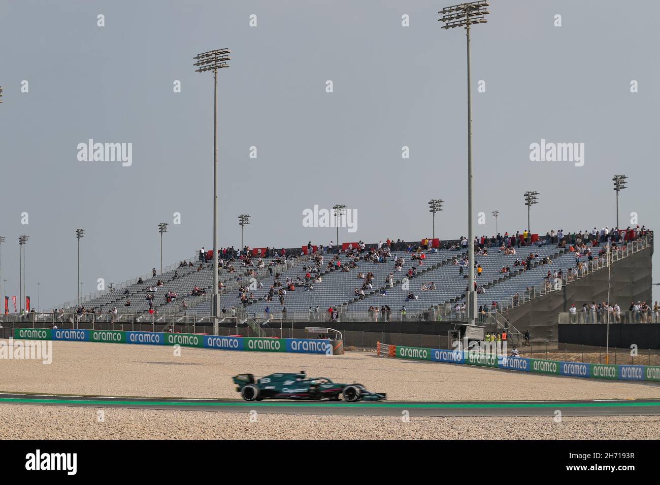 Empty grandstands, with cars running during the Formula 1 Ooredoo Qatar ...