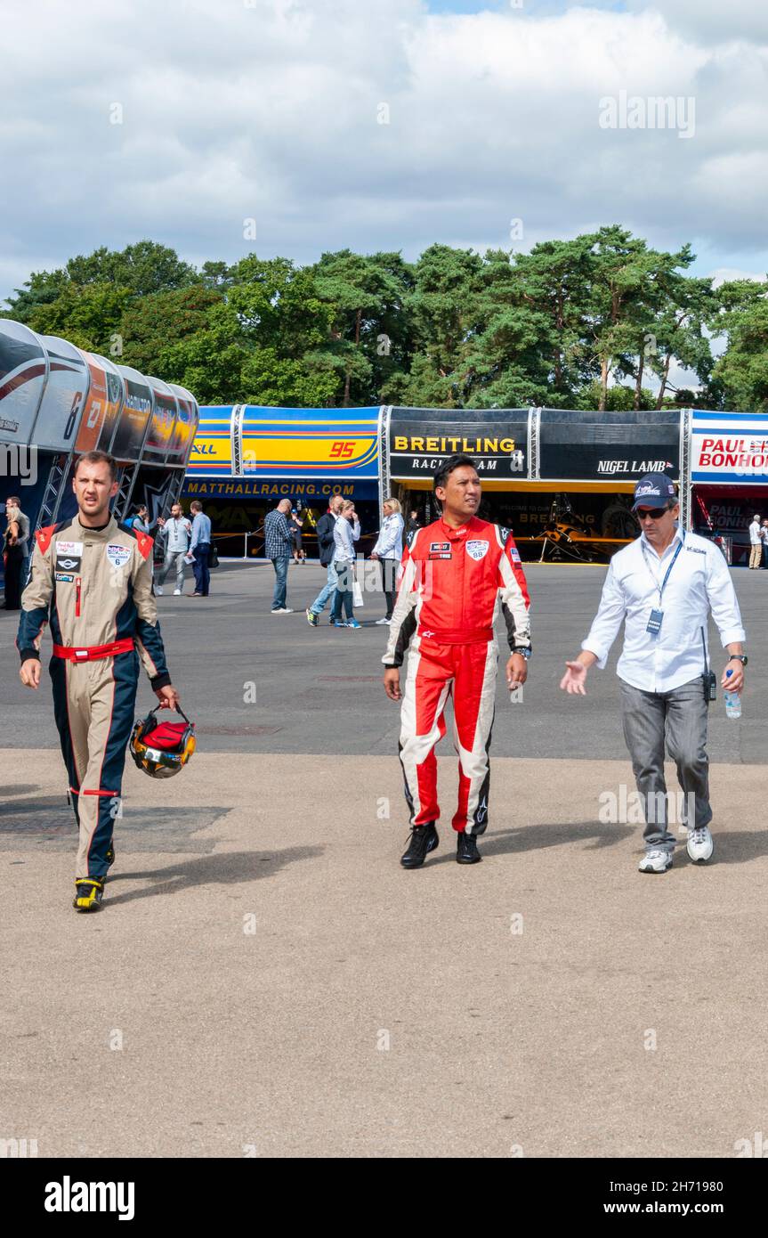 Luke Czepiela and Halim Othman walking in the temporary hangar area at ...