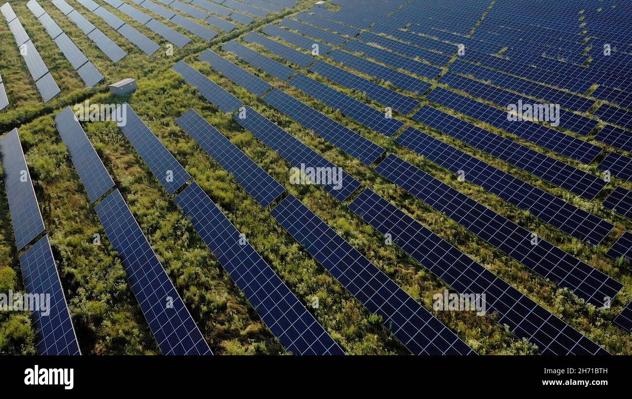 View of a solar power plant, rows of solar panels, solar panels, top ...
