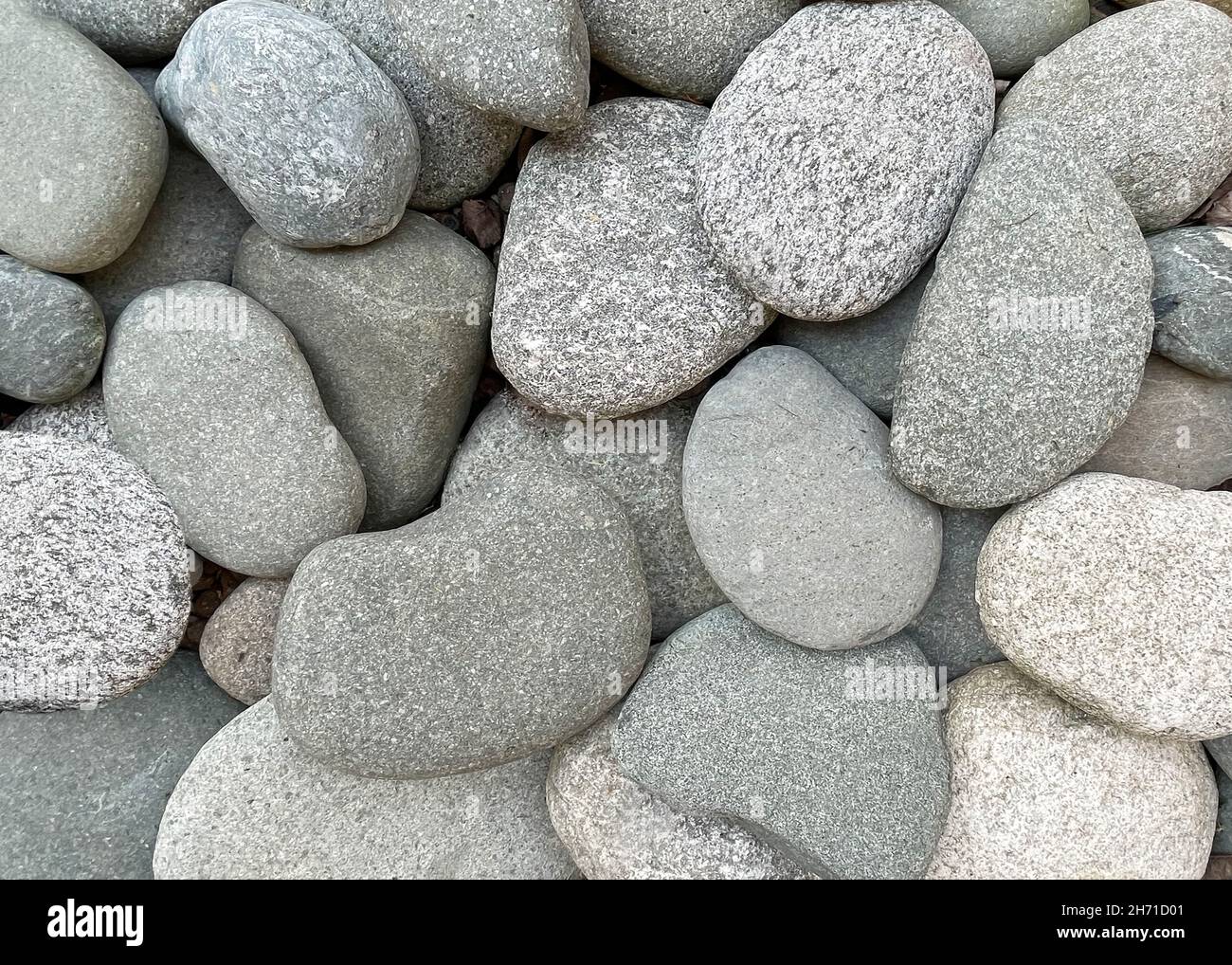 Pebble round stones for meditation on blurred abstract background ...
