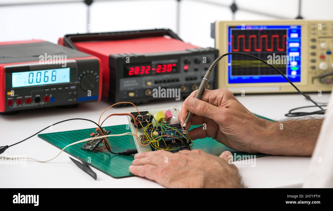 Computer motherboard repair in customer service laboratory workshop ...