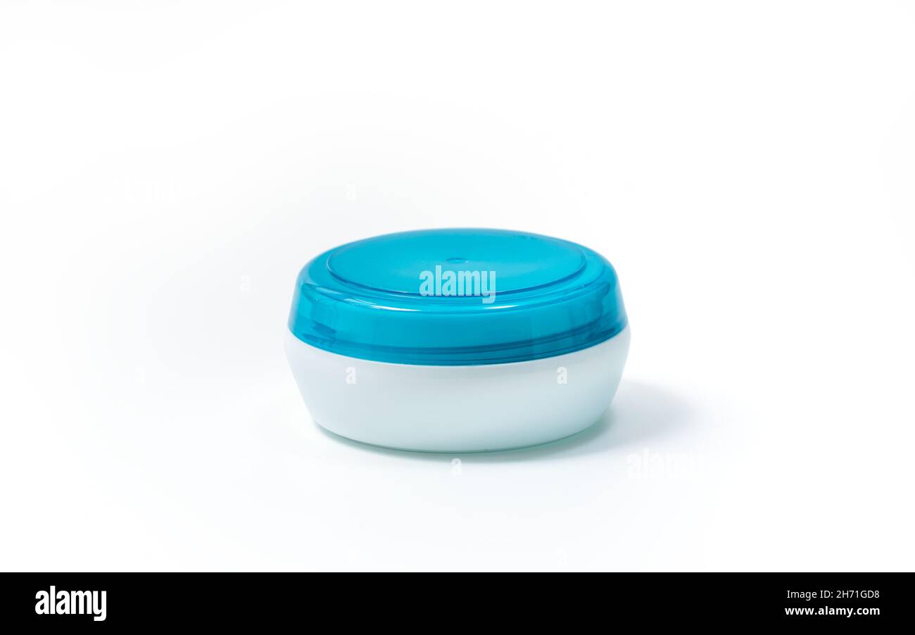 Empty White Plastic opaque cream jar with blue translucent lid ...