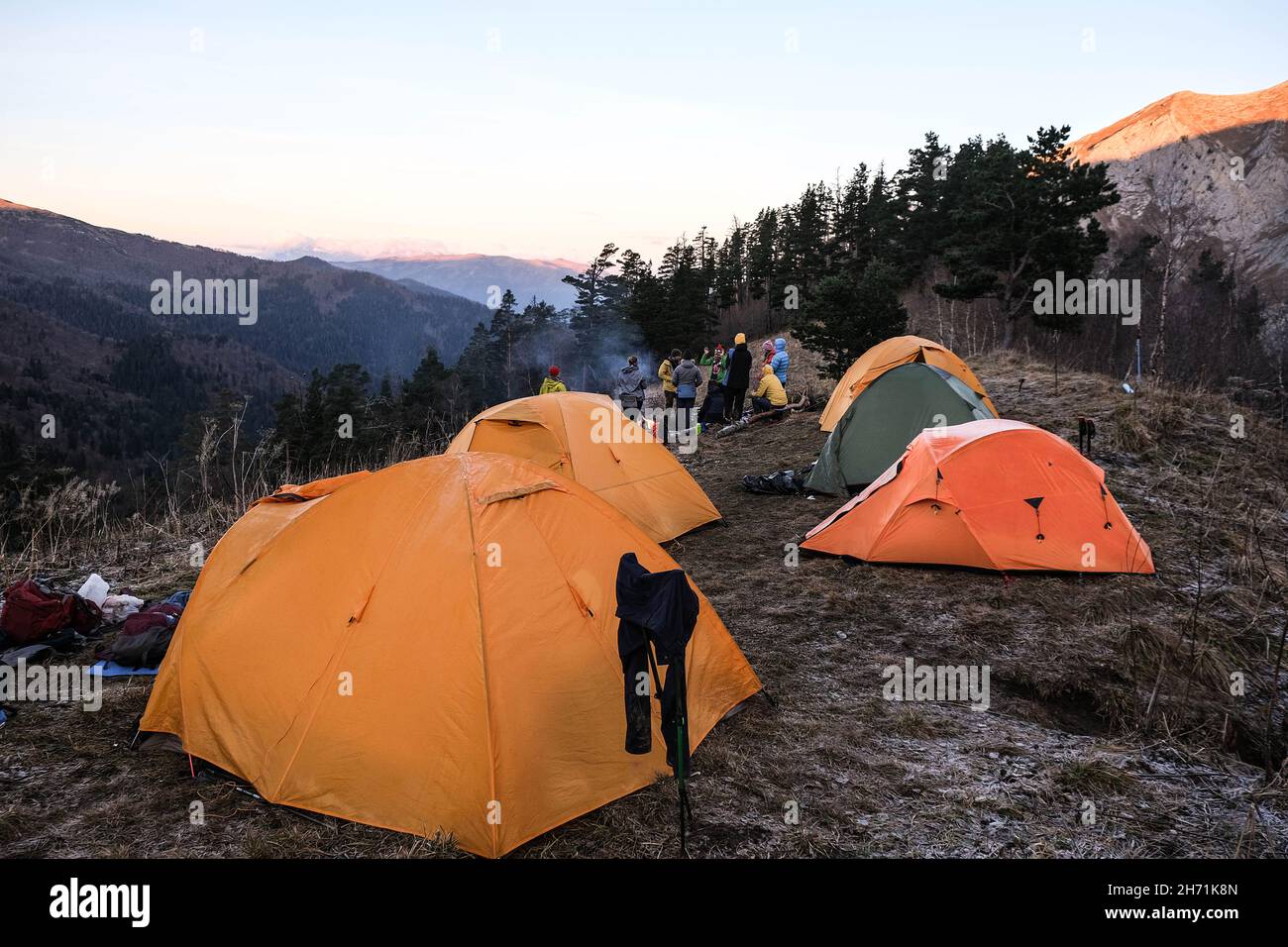 Tourist camp with yellow and green tents Stock Photo - Alamy