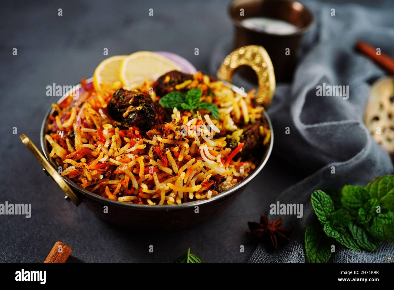 Homemade Mutton lamb biryani served with yogurt raita Stock Photo - Alamy