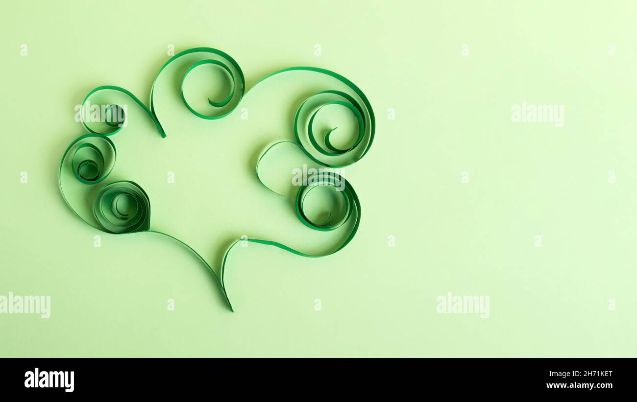 Human brain made from paper on green background,sketch.Large banner ...