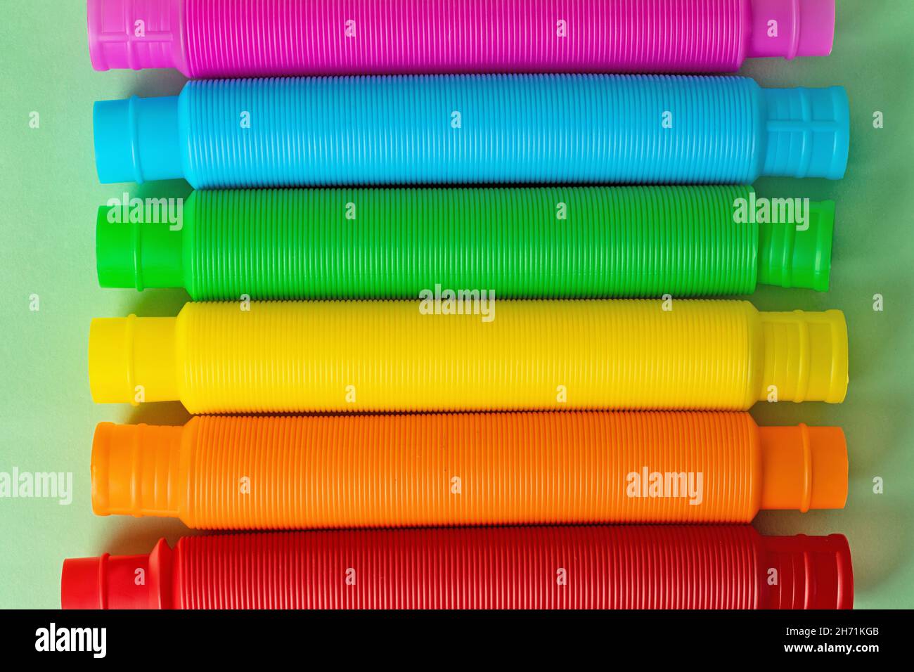 Top view of colorful pop tubes,new fidget antistress toy Stock Photo ...