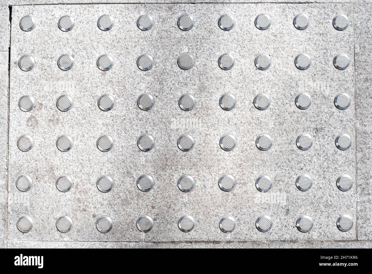 Shiny metal plate with rows of small bumps as background Stock Photo ...