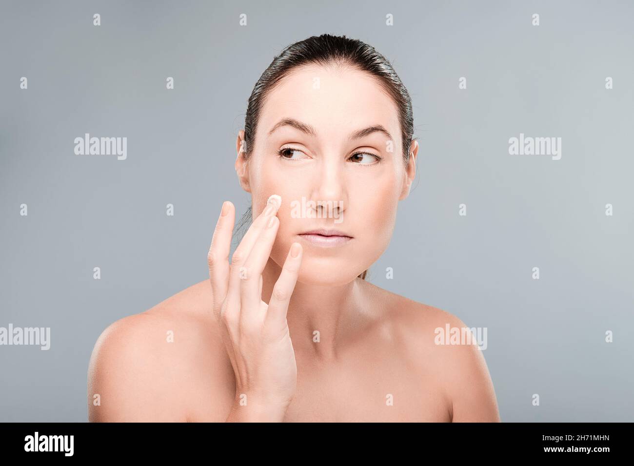 Cream in the face hi-res stock photography and images - Alamy