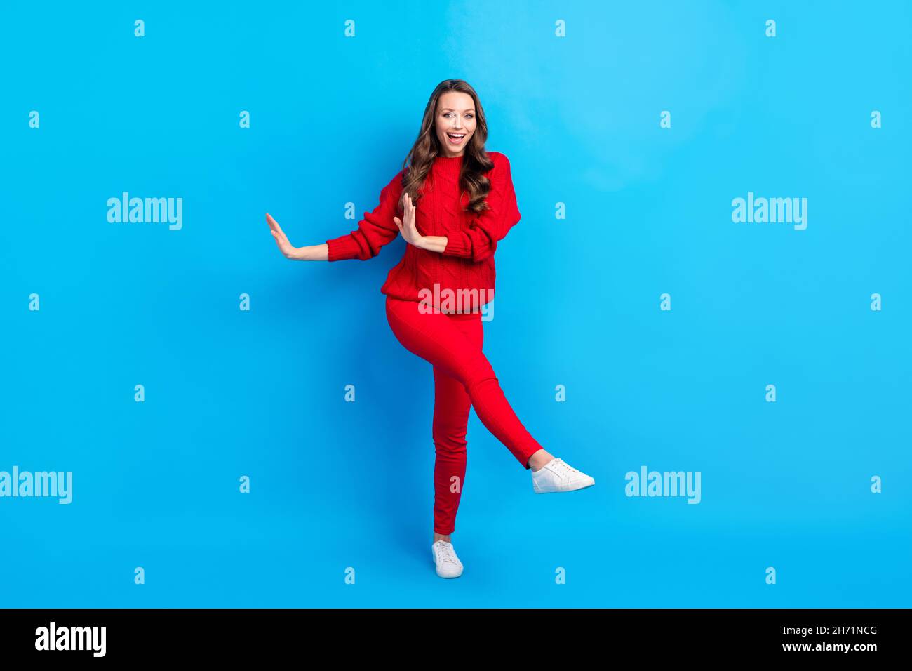 Full length portrait of pretty cheerful lady toothy smile raise leg ...