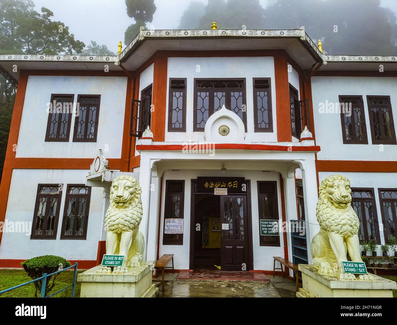 japanese buddhist colorful monastery covered with cloud at morning from ...