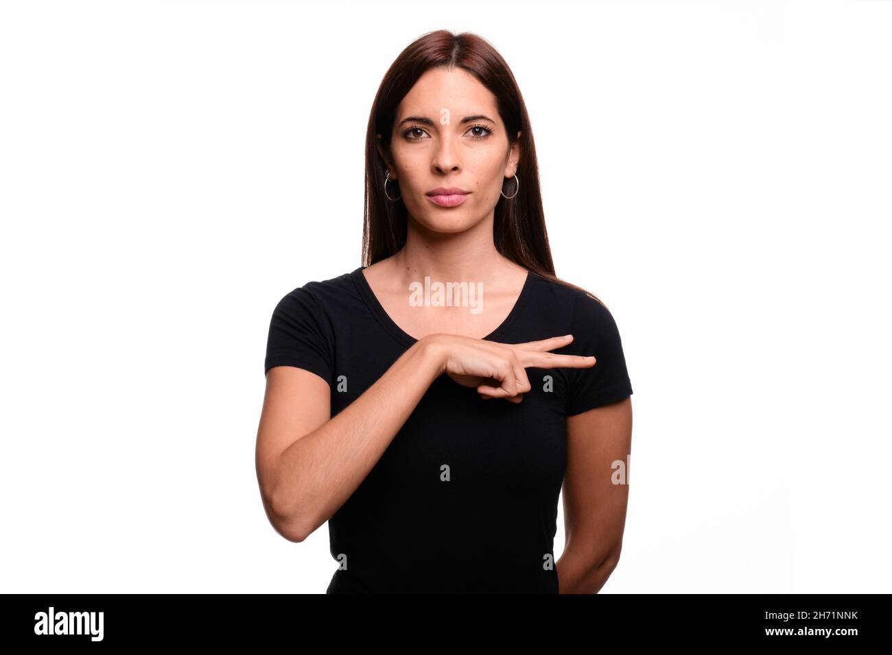 Isolated in white background brunette woman saying green in spanish ...