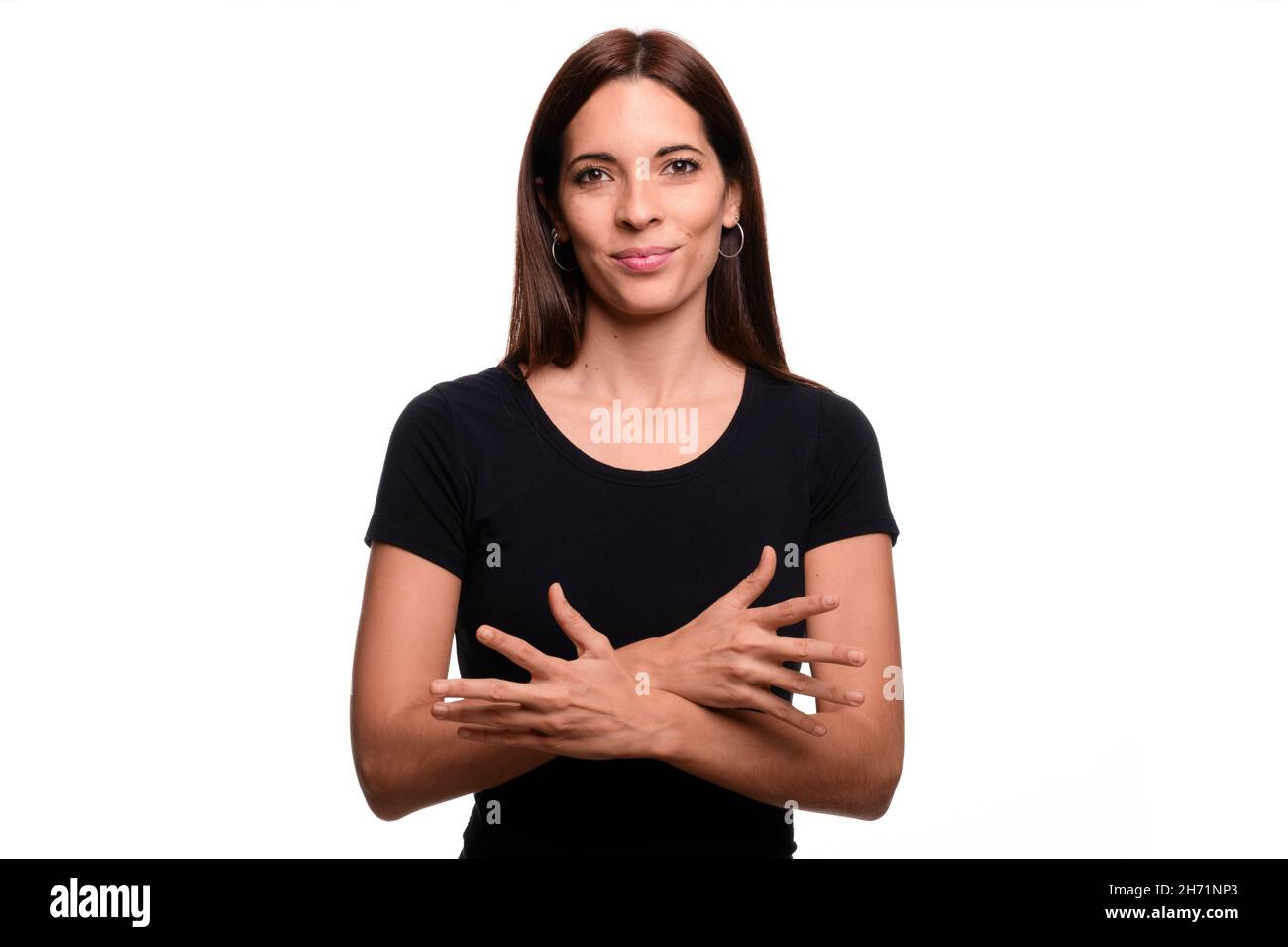 Isolated in white background brunette woman saying play in spanish sign ...