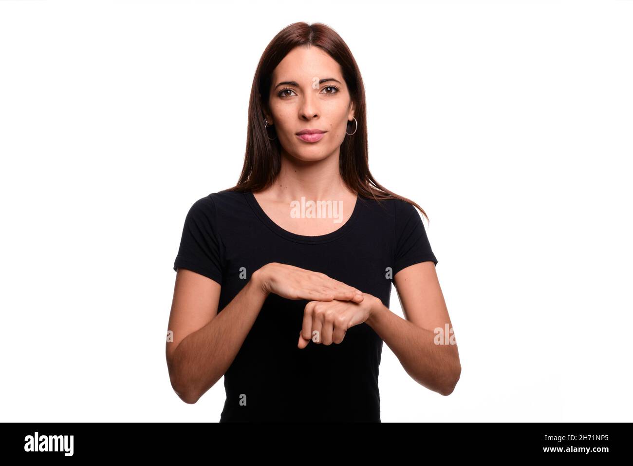 Isolated in white background brunette woman saying sorry in spanish ...
