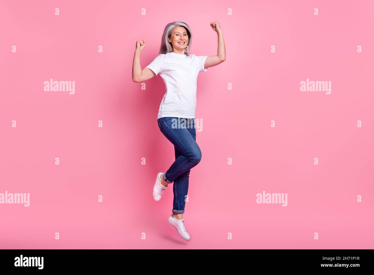 Full length body size photo of woman jumping up gesturing like winner ...