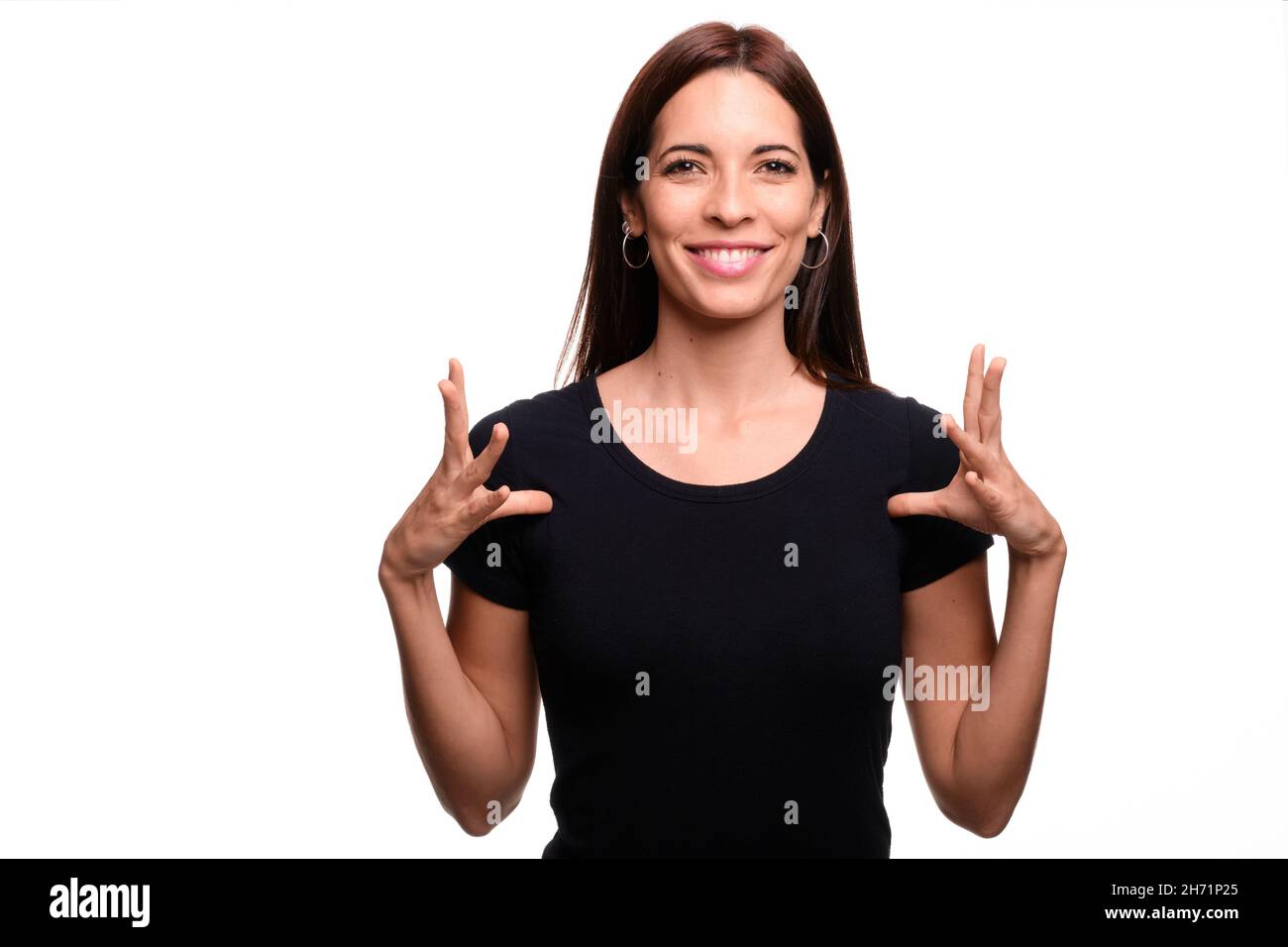Isolated in white background brunette woman saying holidays in spanish ...