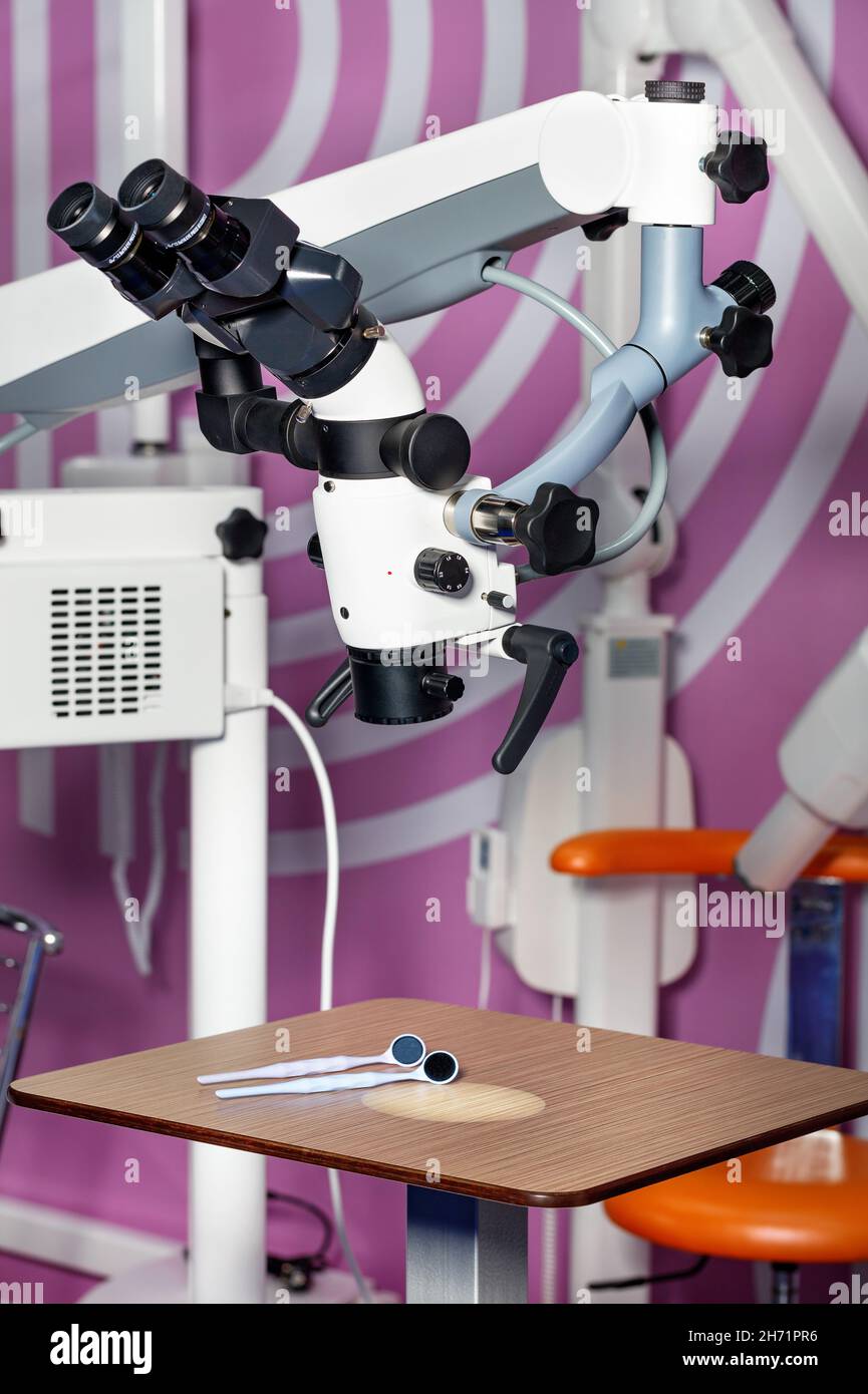 Dental office interior, microscope for dental treatment, dental ...