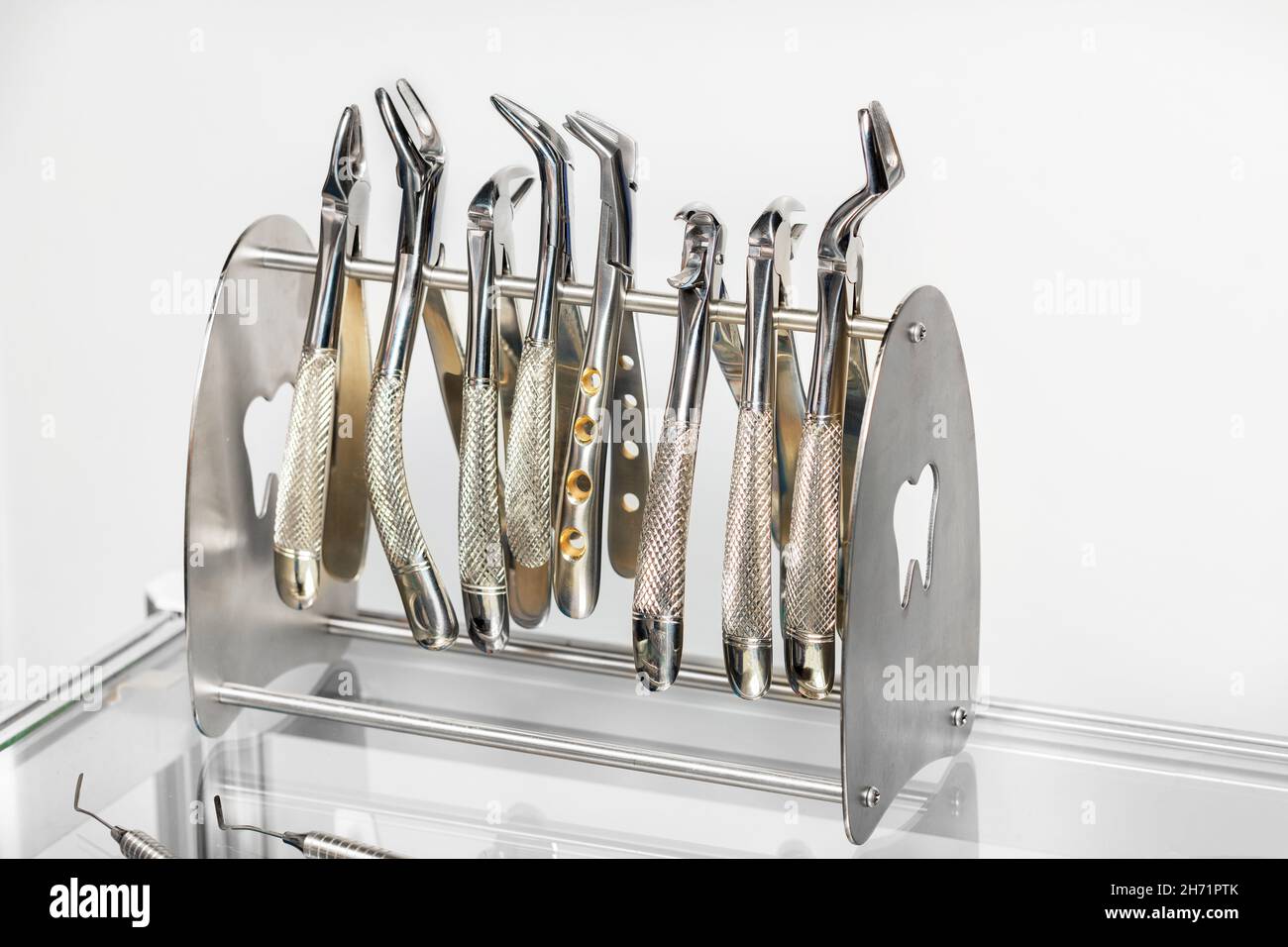 Close-up of a set of various instruments, stainless steel forceps in a ...