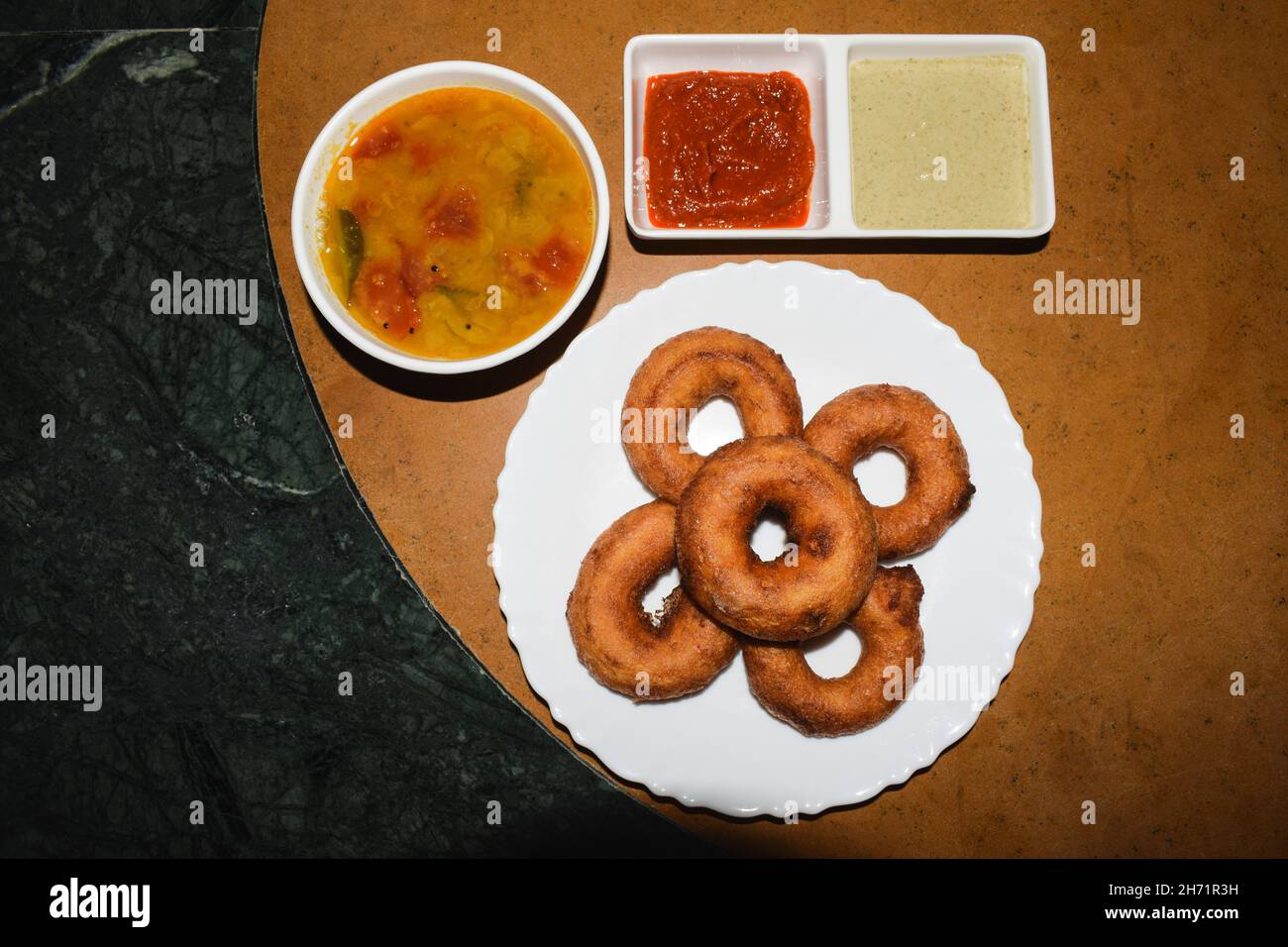 Tasty homemade south Indian deep fried medu wada served with homemade ...