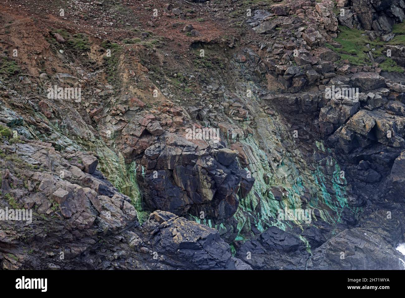 Copper deposits on the cliff below Levant Mine North Cornwall UK Stock ...