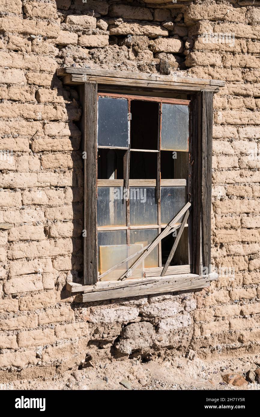 A window in the adobe brick wall of the Grant House, the stagecoach ...
