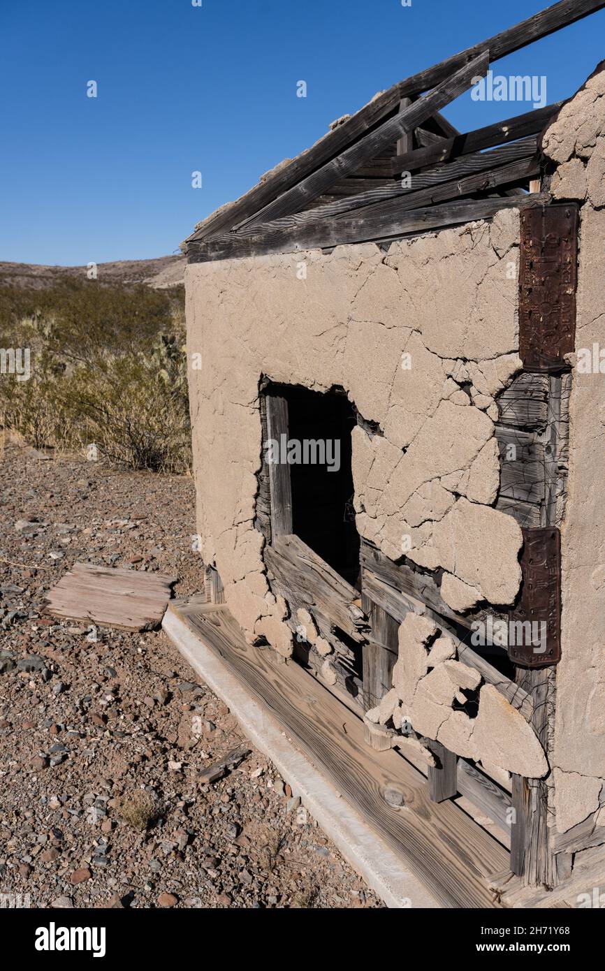 An old dilapidated wood and plaster cowboy line cabin in the ghost town ...