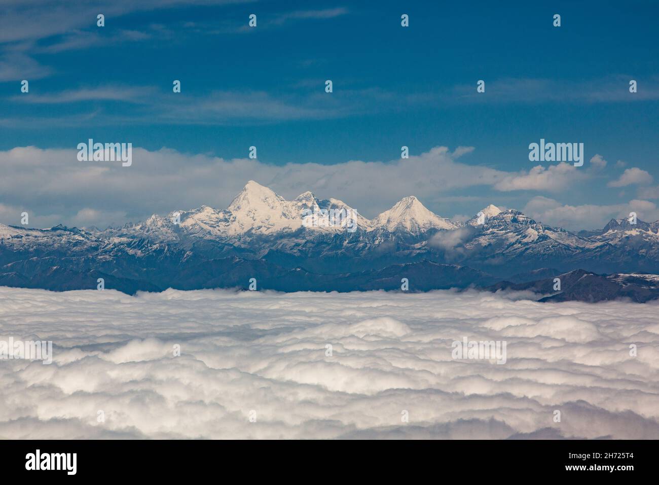 Mount Jumolhari Tsering Gang, left, and Jichu Drake, right center ...