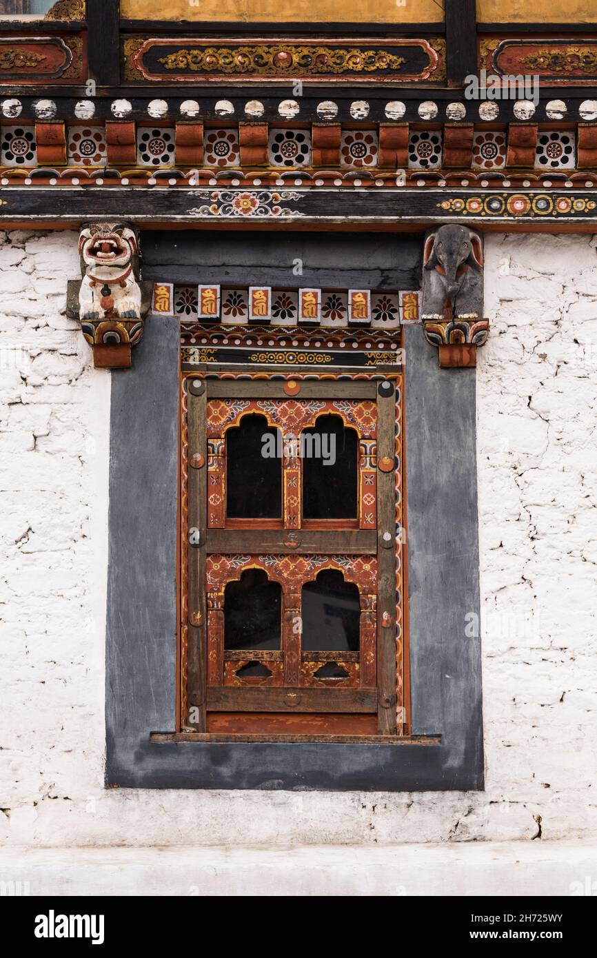 An ornately decorated window in the Thimphu Dzong in Thimphu, Bhutan ...