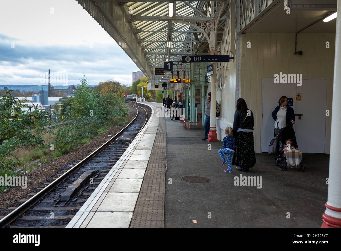 Northern Rail trains pass through the West Yorkshire railway station of ...