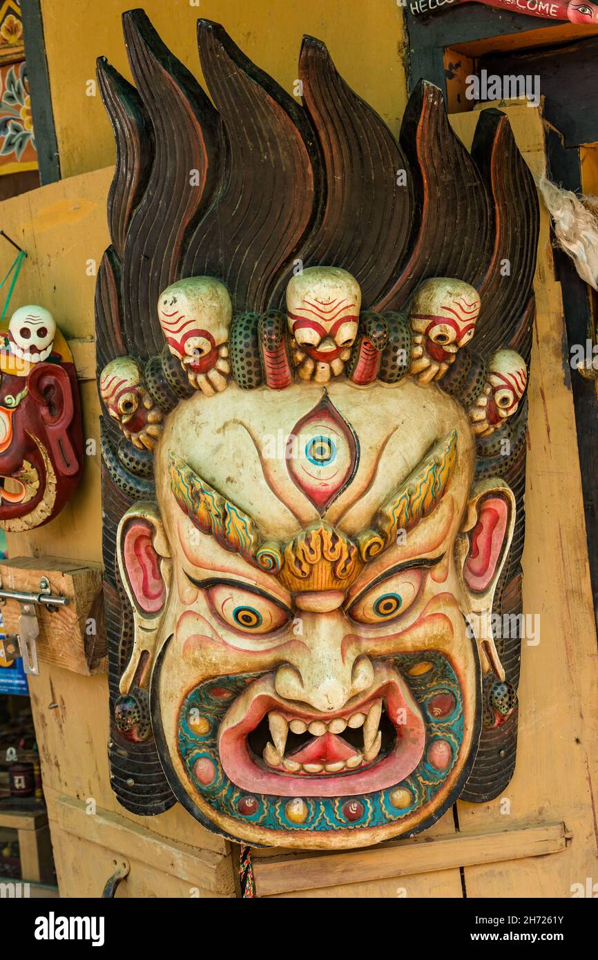 A symbolic Bhutanese wooden mask, locally called a bhaap, representing ...