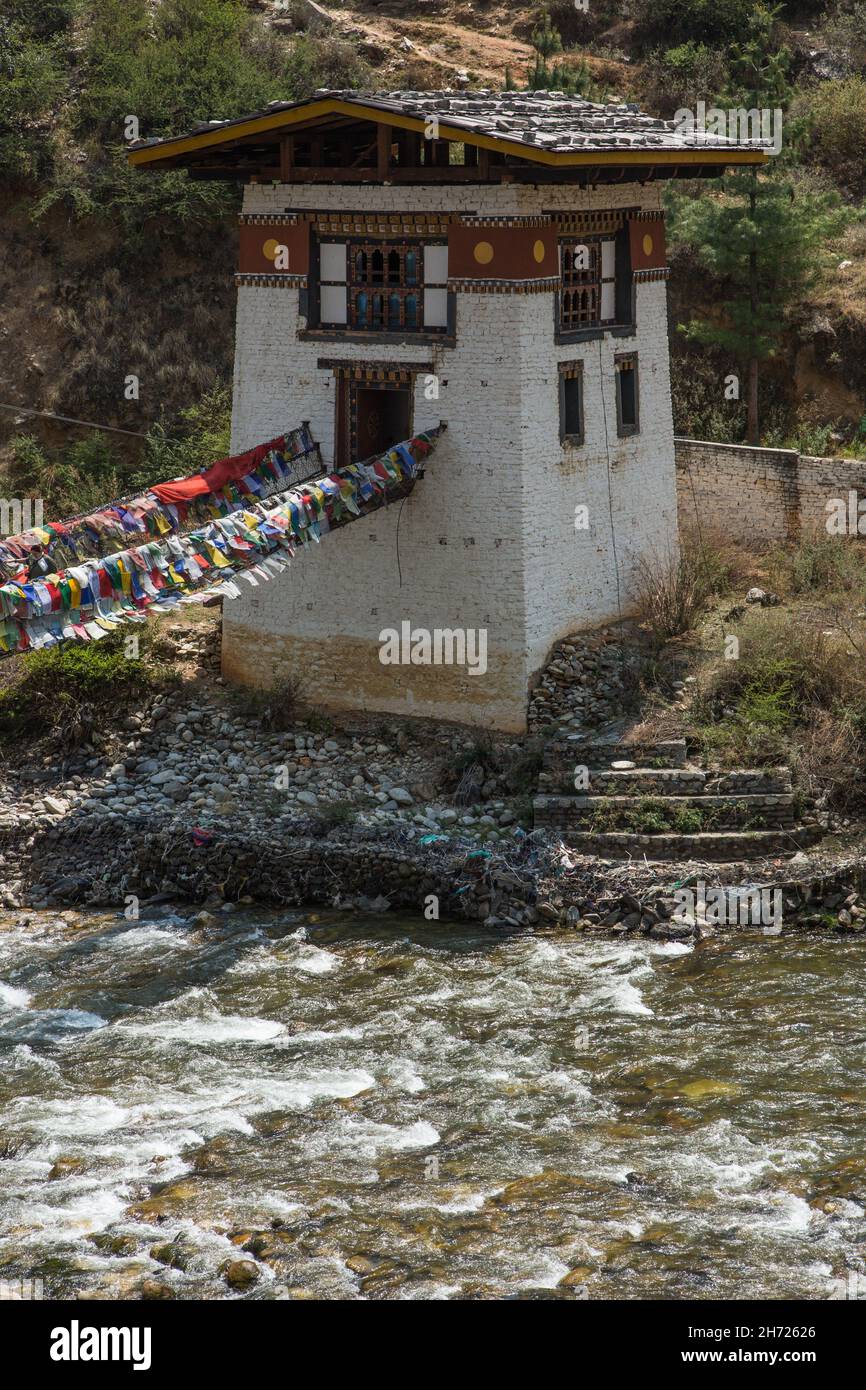 A bridge tower for the last remaining iron chain bridge in Bhutan over ...