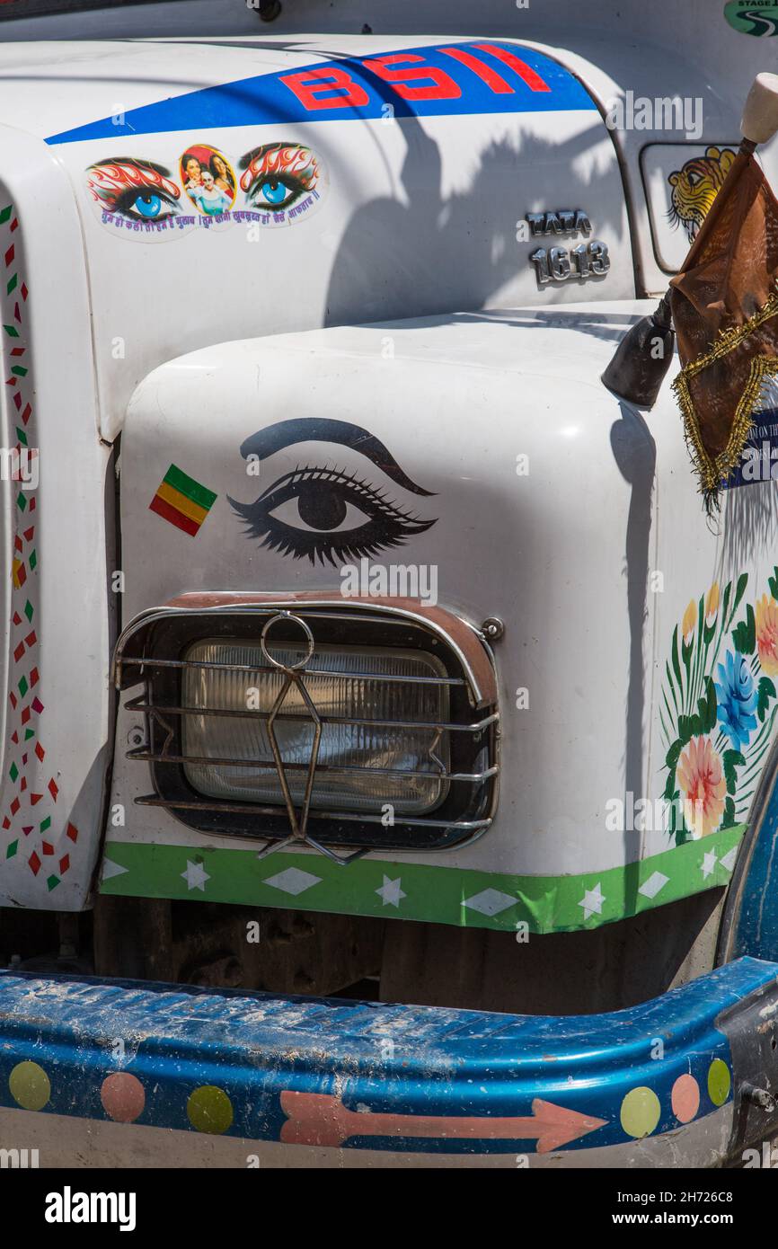 The all-seeing eye of Buddha painted for good luck above the headlight ...
