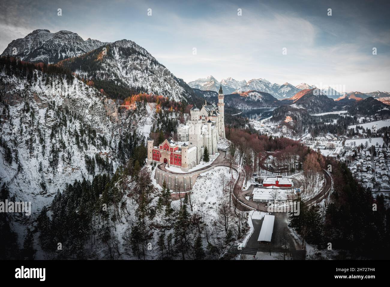 Scenic shot of the Neuschwanstein Castle in Germany surrounded by snowy ...