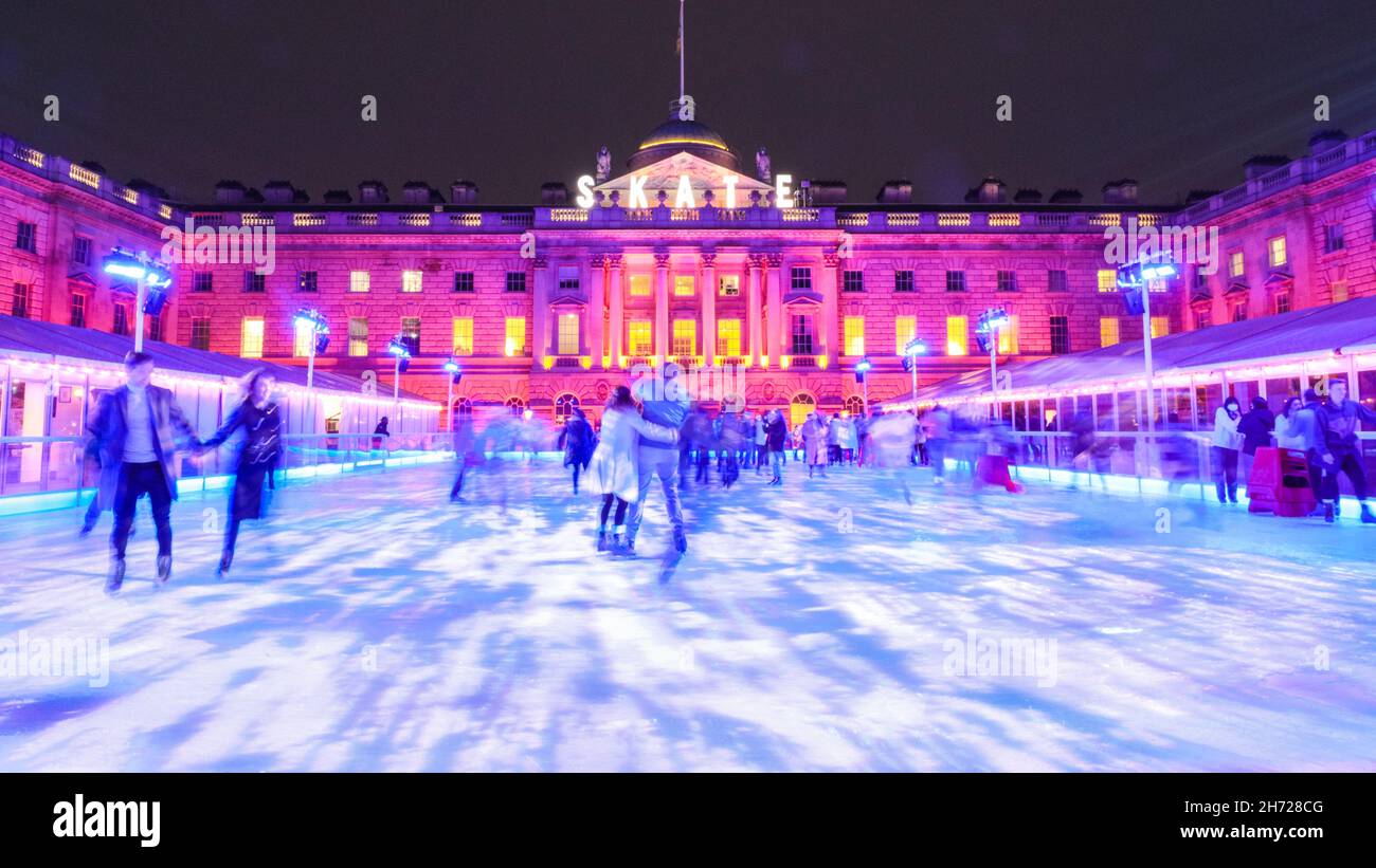 London, UK. 19th Nov, 2021. People enjoy ice skating in the courtyard ...