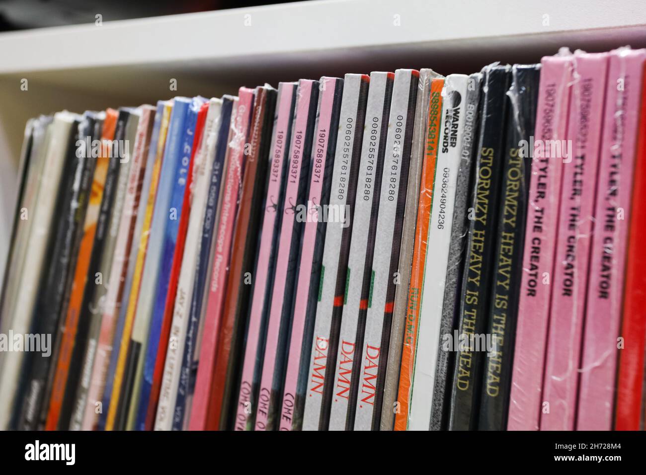 Pile of many close standing vinyl records in old color paper covers on ...