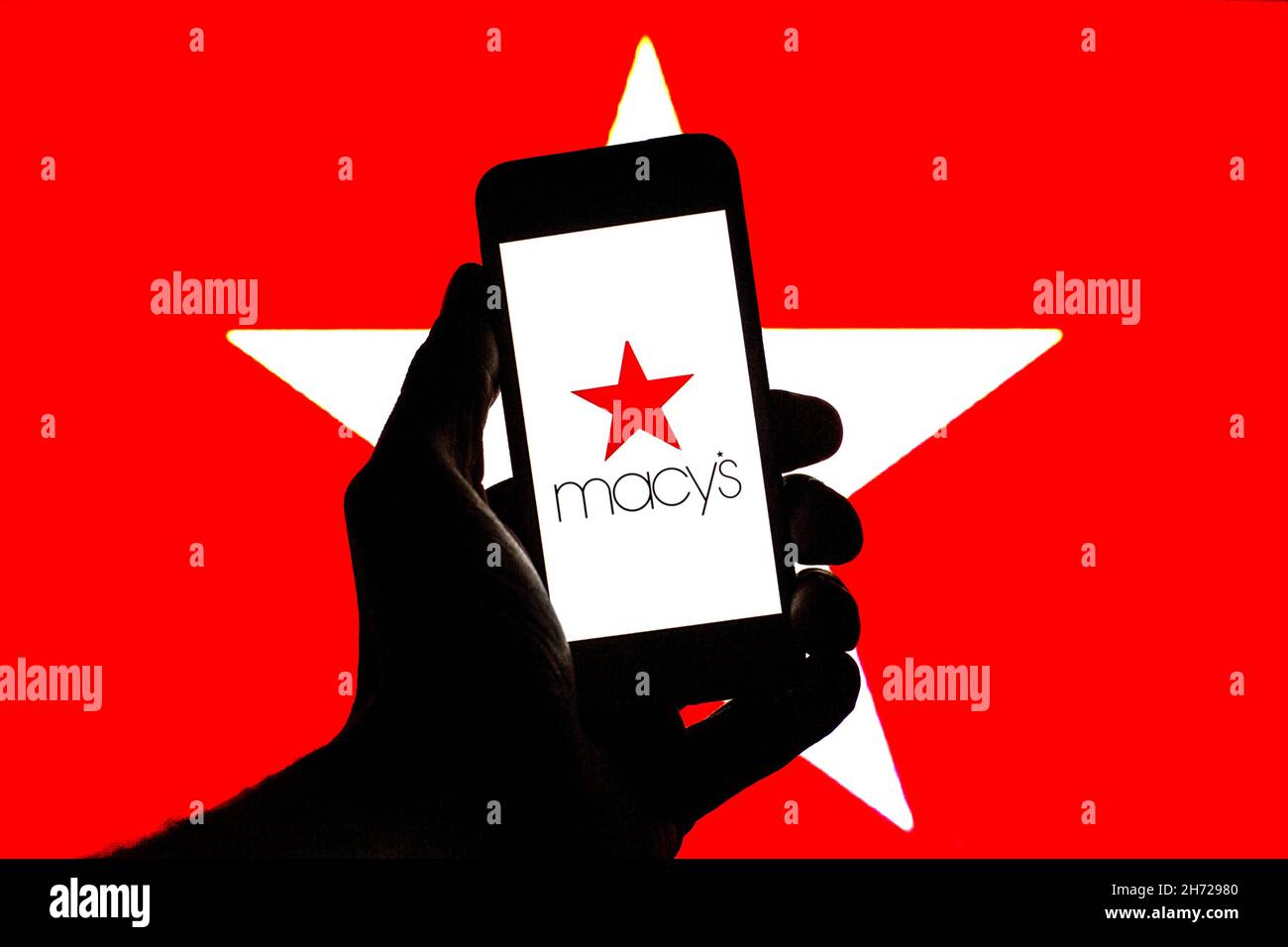 In this photo illustration, a Macy's logo is seen on a smartphone ...