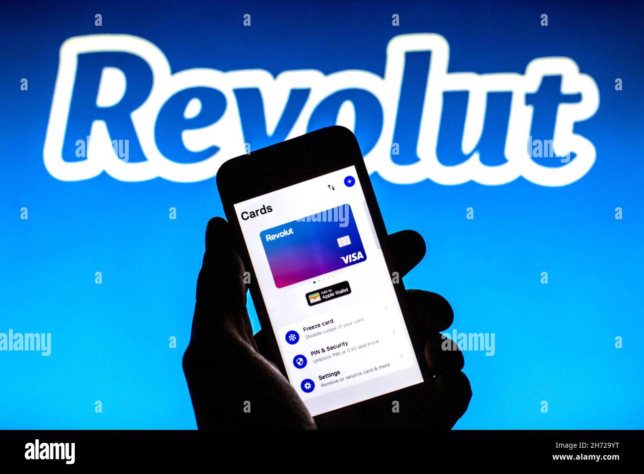 In this photo illustration, a Revolut Visa Card is seen on a smartphone ...