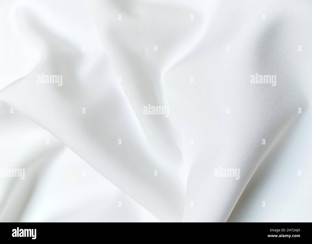 White crumpled or wavy fabric texture background. Abstract linen cloth ...
