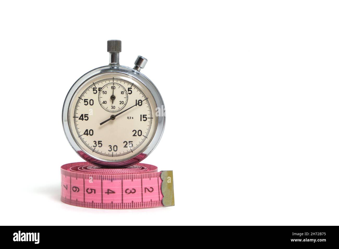 Stopwatch and measuring meter on white background.Sports, health and ...