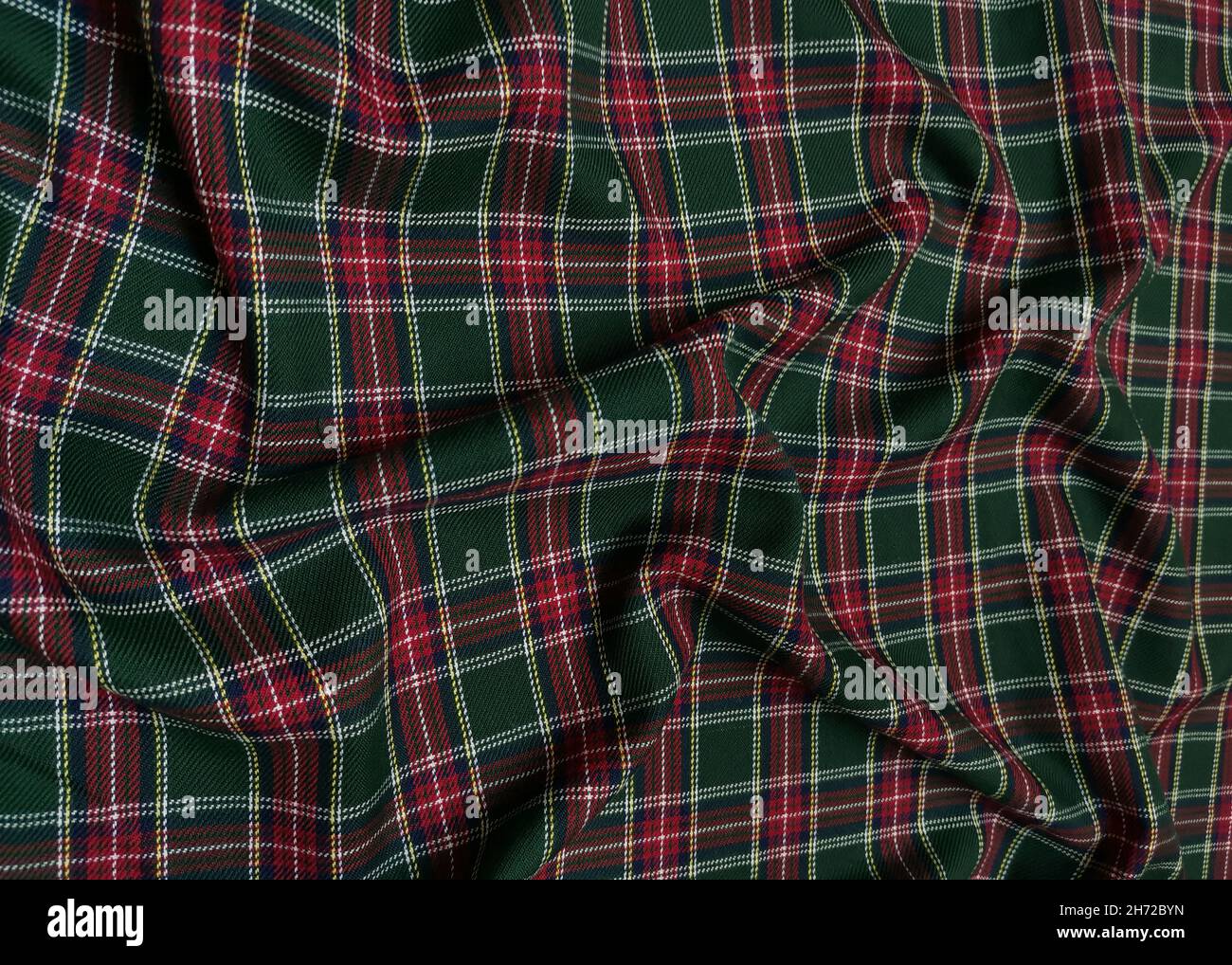 Green tartan woolen school uniform fabric material. Scottish classic ...