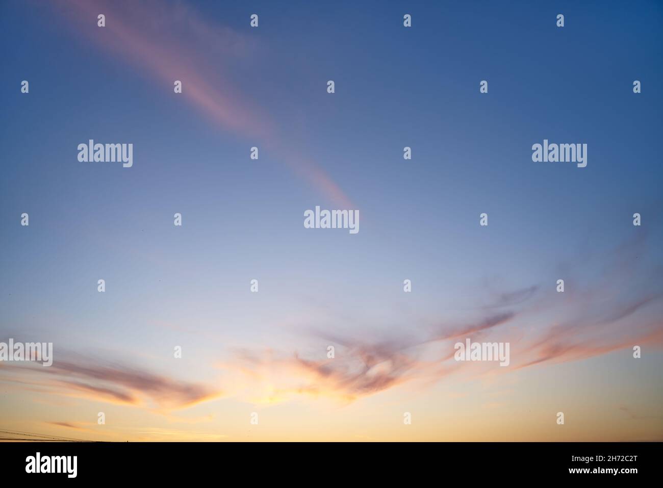 Real sundown sunset sky with beautiful light clouds and sun, wothout ...