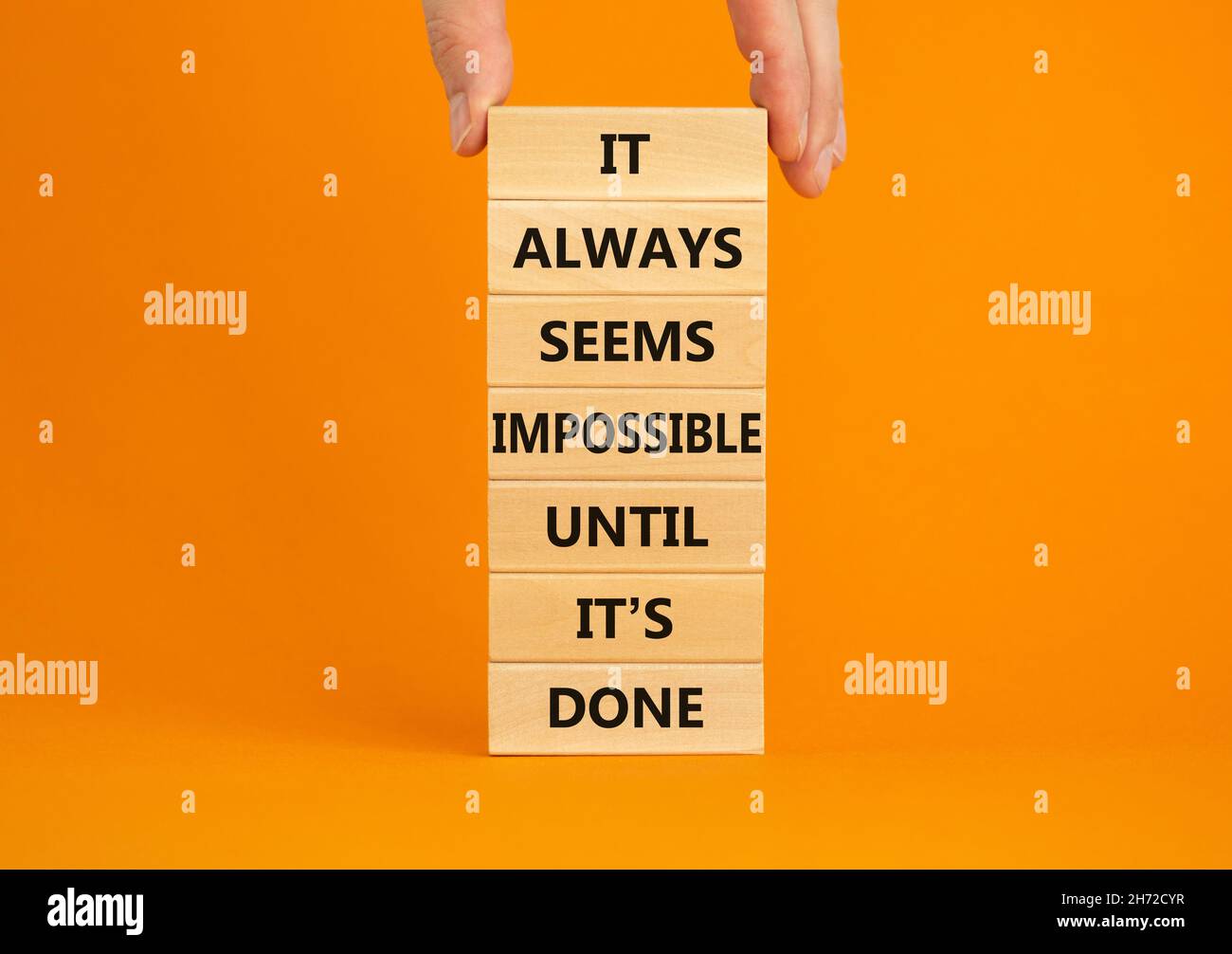 Possible or impossible symbol. Wooden blocks with words It always seems ...