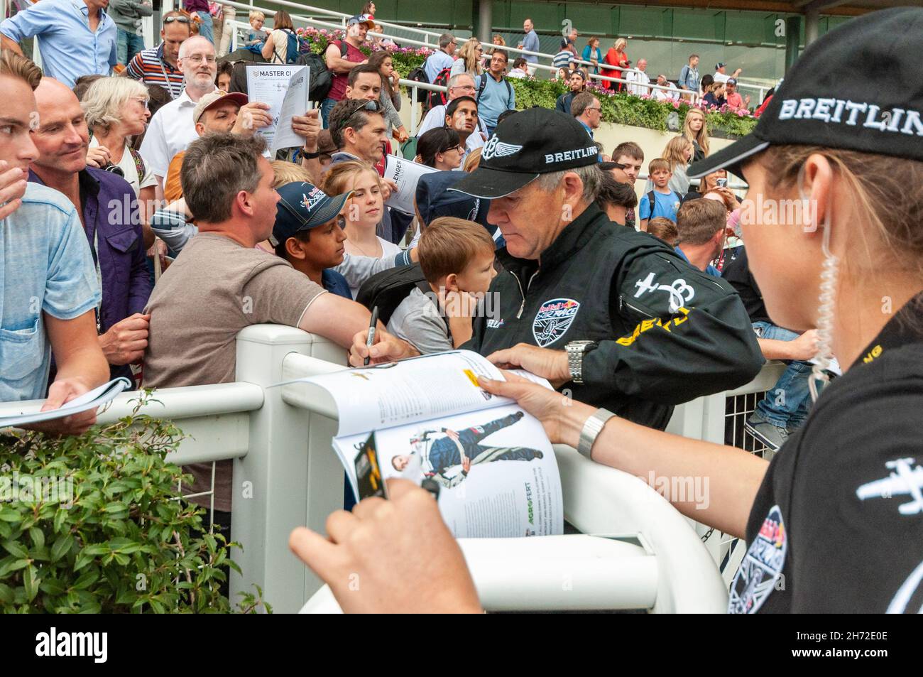 Pilot Nigel Lamb signing autographs after the Red Bull Air Race at ...