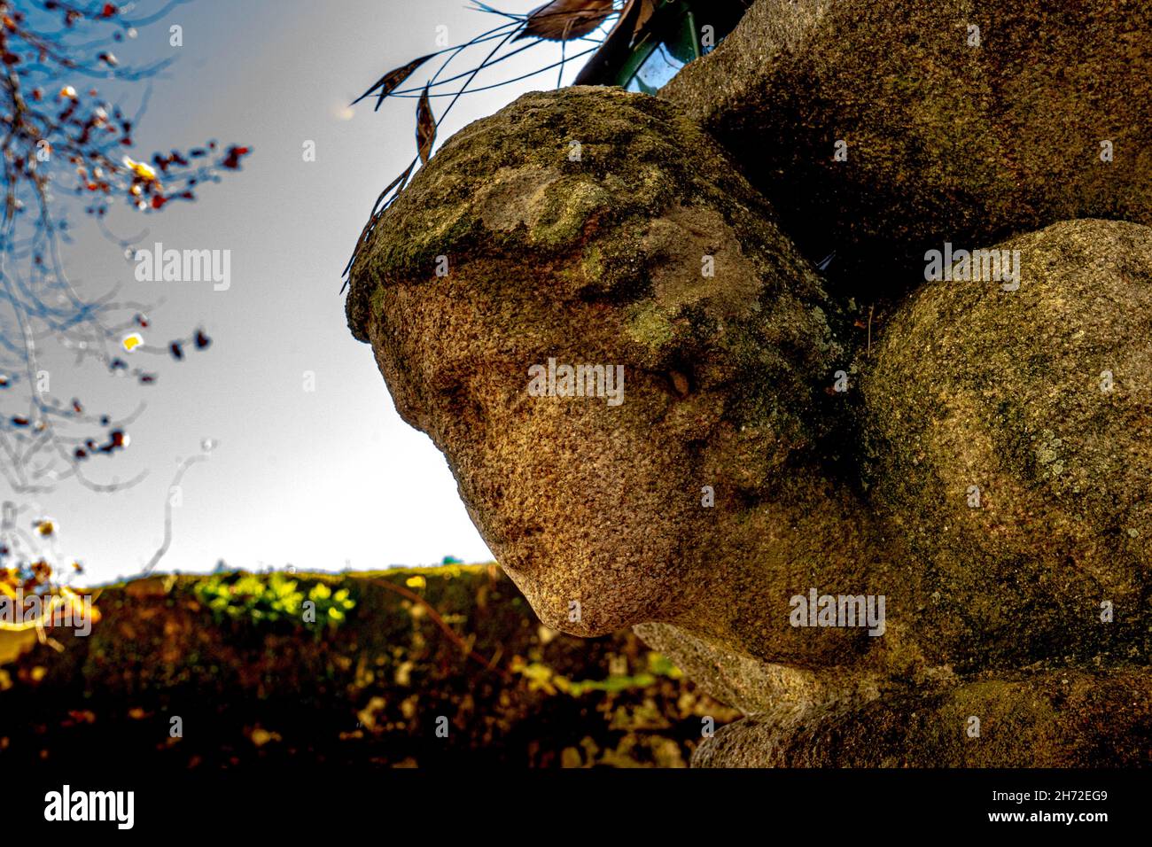 stone human head Stock Photo - Alamy