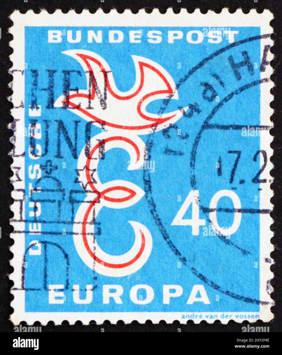 GERMANY - CIRCA 1958: a stamp printed in the Germany shows E and Dove ...