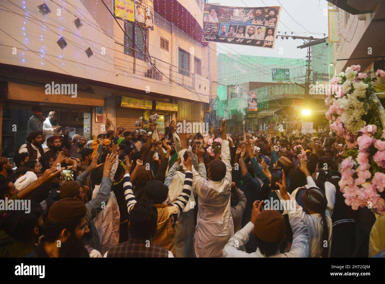 Supporters celebrate after Tehreek-e-Labbaik Pakistan (TLP) chief Hafiz ...