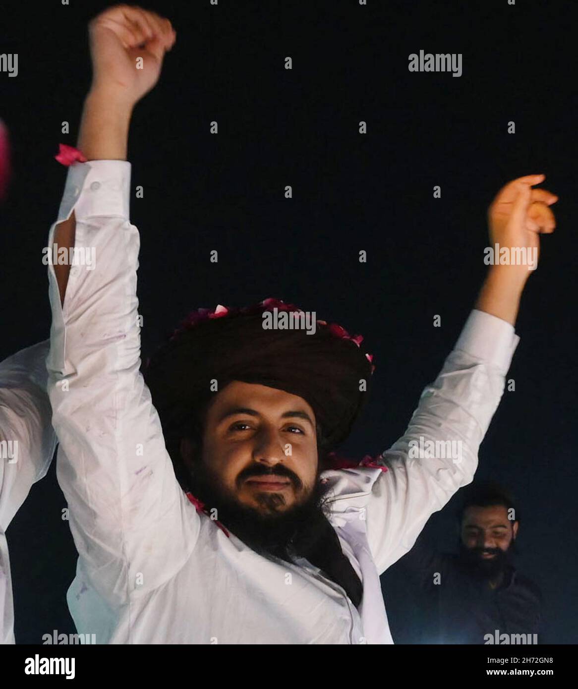 Tehreek-e-Labbaik Pakistan (TLP) chief Hafiz Saad Rizvi celebrates with ...