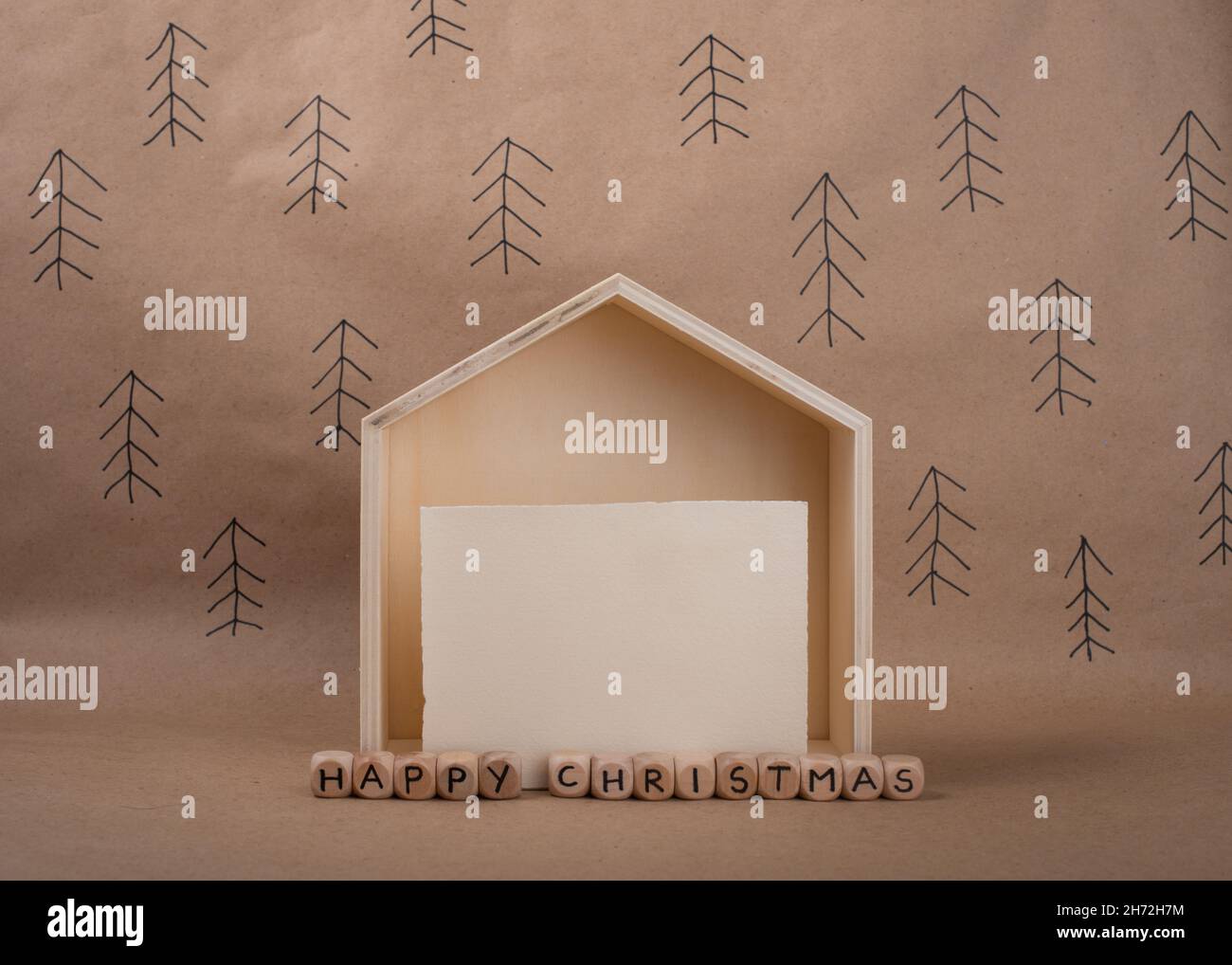 Hand made wooden house and blank card with space for invitation or ...